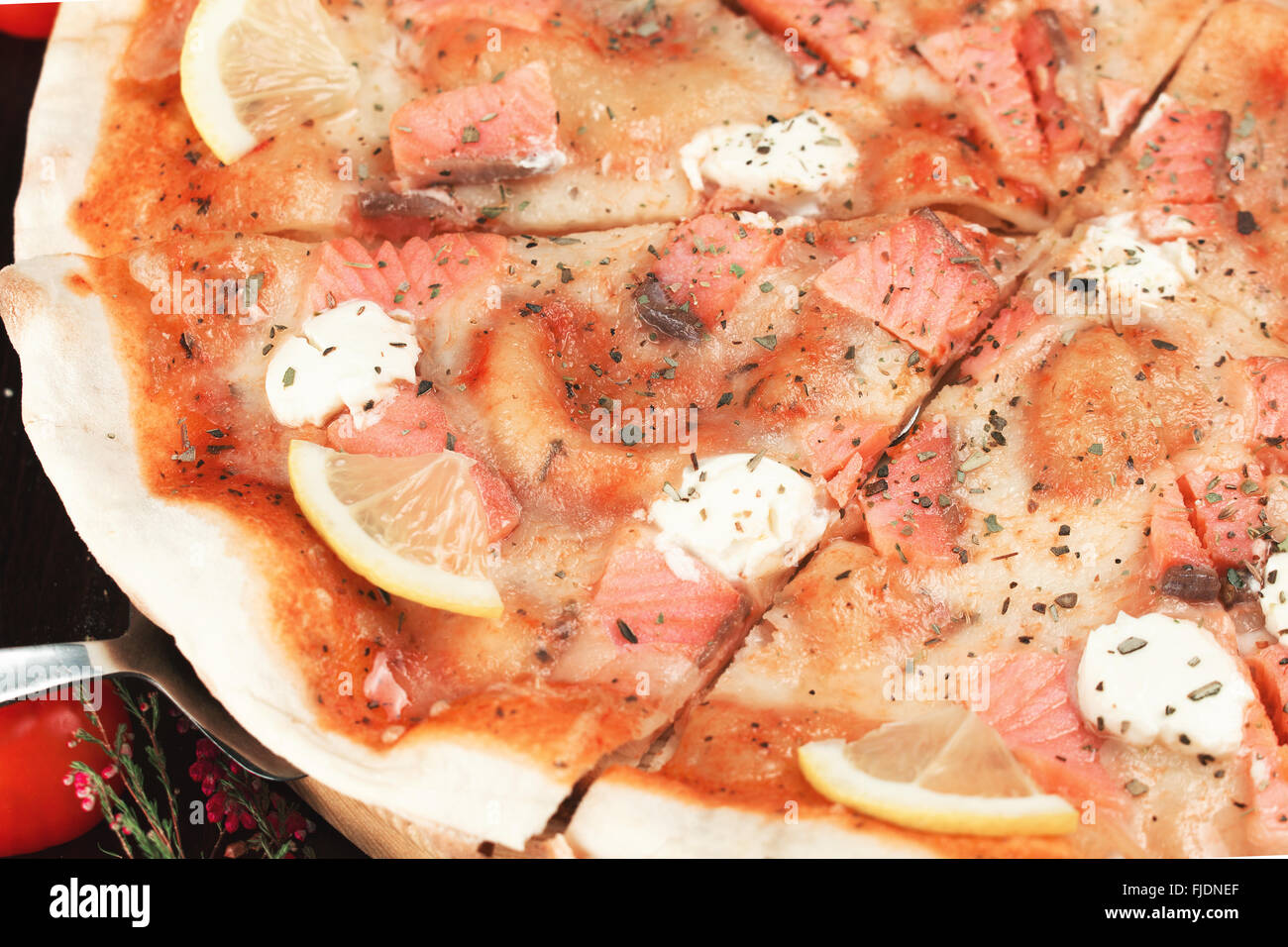 Tasty pizza with fish and cheese. Shallow depth of field Stock Photo ...