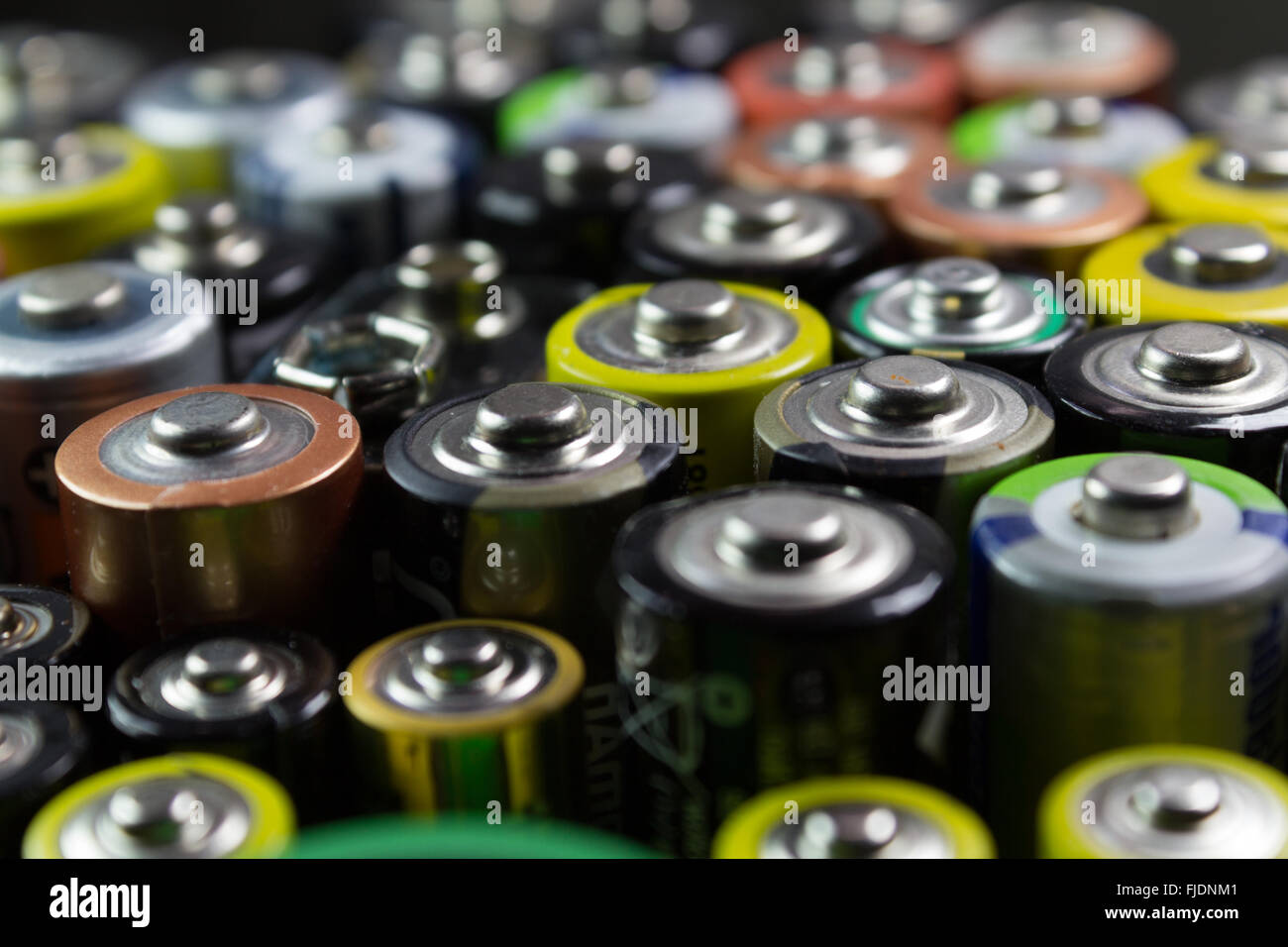 Batteries of different types and colors Stock Photo - Alamy