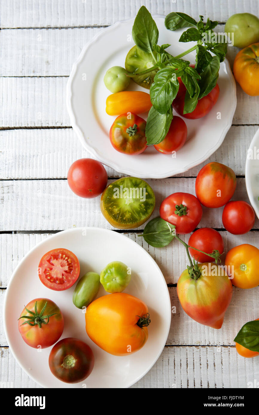fresh organic tomatoes on boards, food top view Stock Photo - Alamy