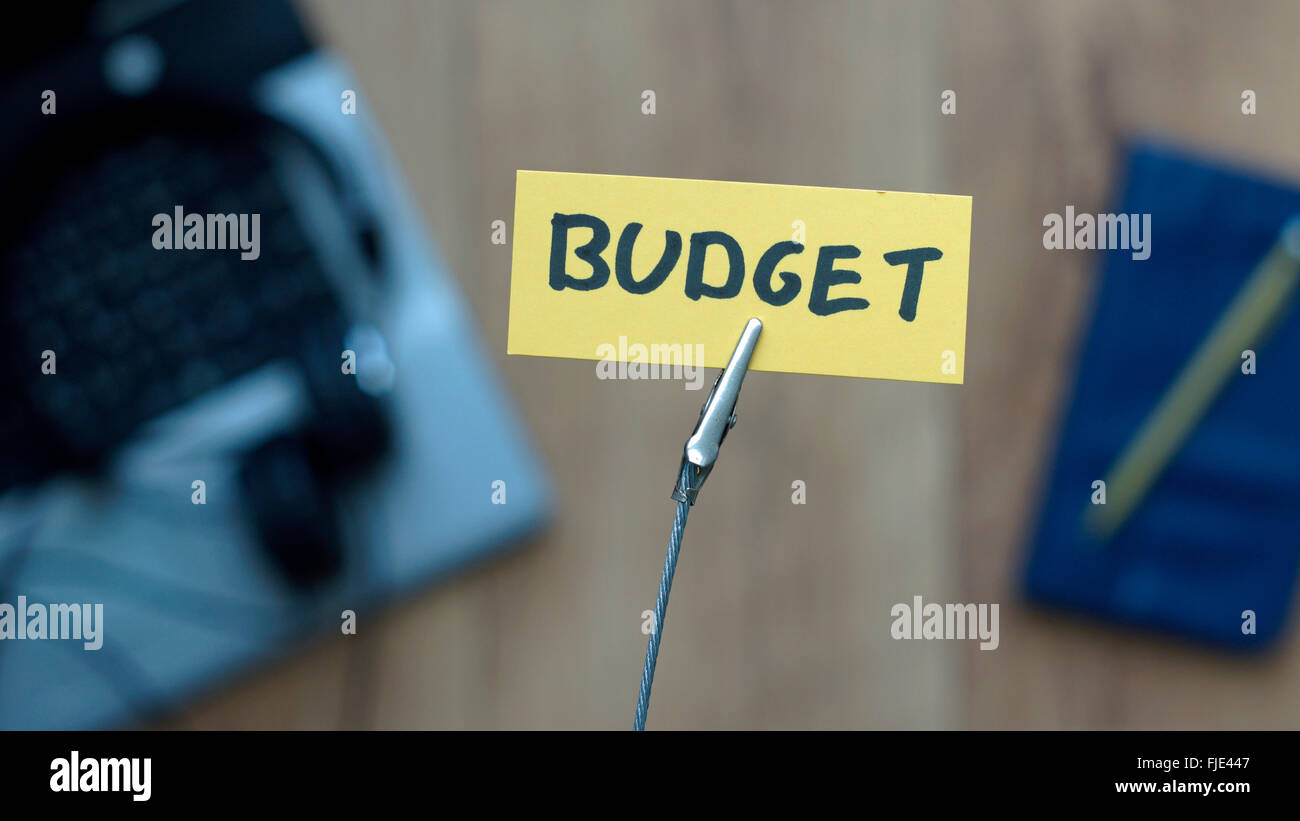 Budget written on a memo at the office Stock Photo - Alamy