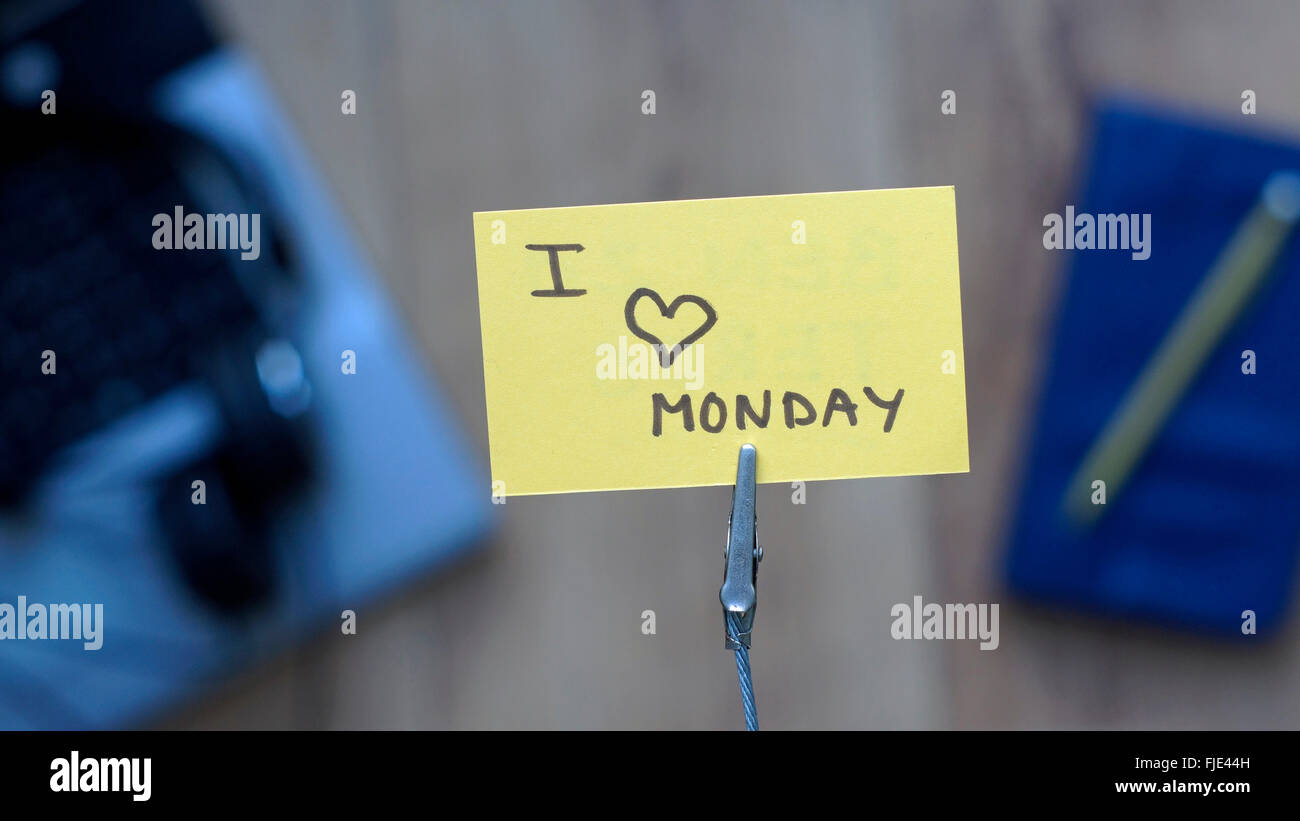 I love monday written on a memo atr the office Stock Photo - Alamy