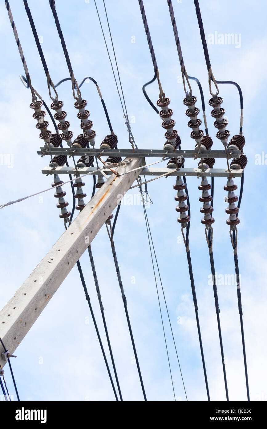 Electricity post and Cable and blue sky Stock Photo - Alamy