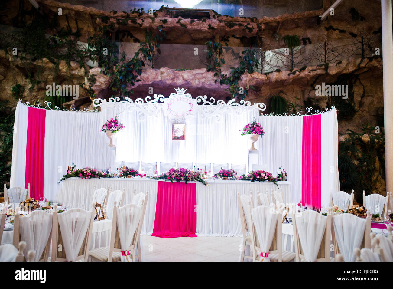 Amazing wedding table in pink style with flowers and foods Stock Photo ...