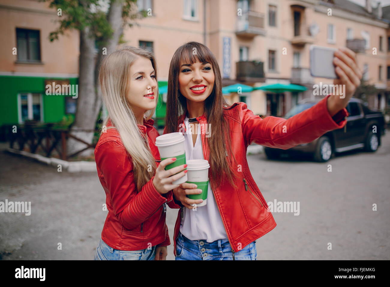 girls with phone Stock Photo - Alamy