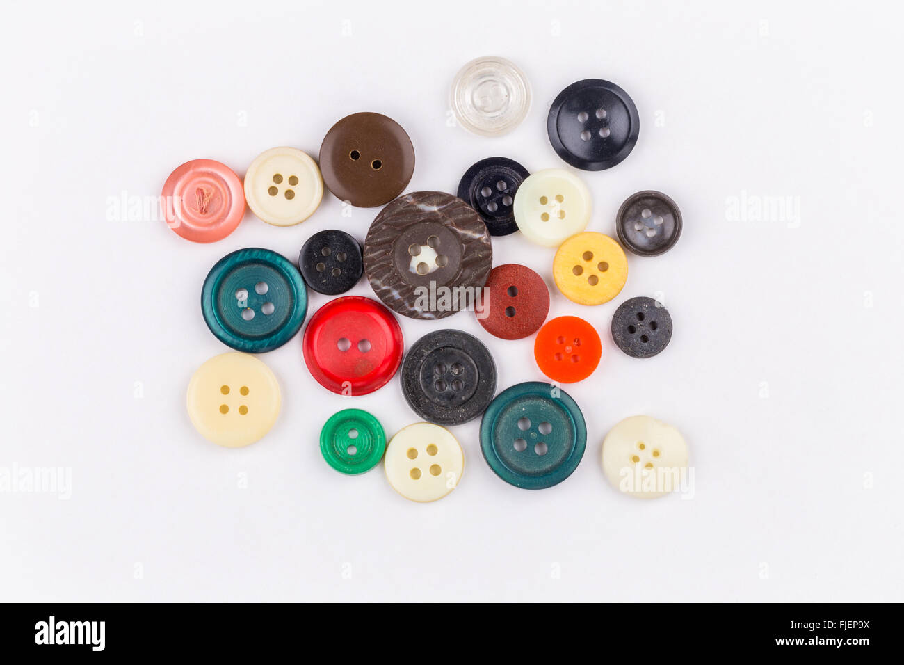 Colored buttons on white background Stock Photo - Alamy