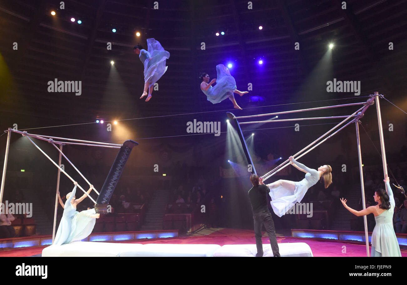 Members of the Skokov acrobat troupe fly through the air at the Circus ...