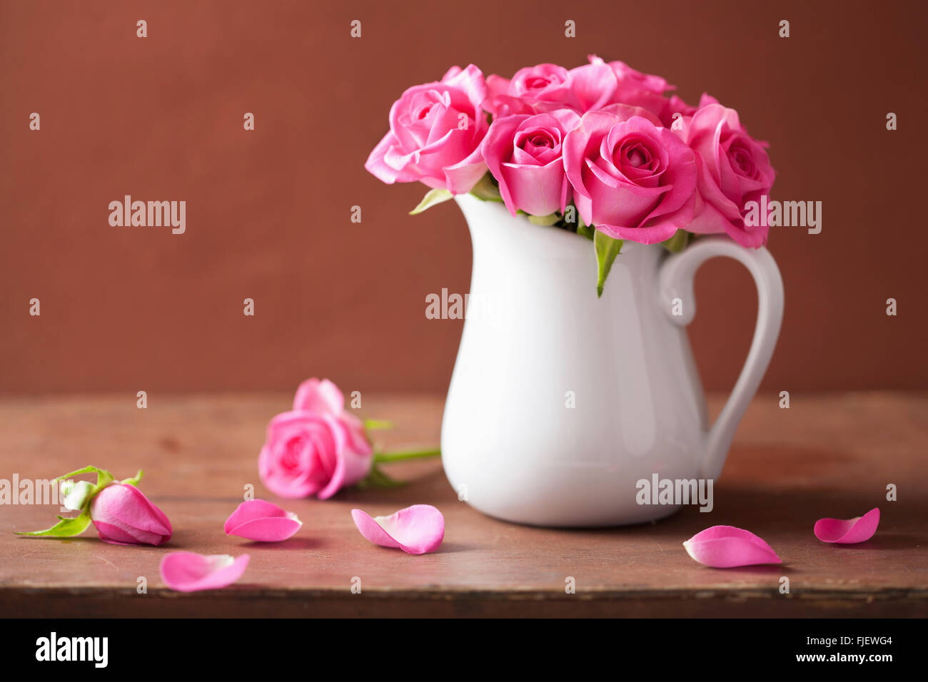 beautiful pink roses bouquet in vase Stock Photo - Alamy