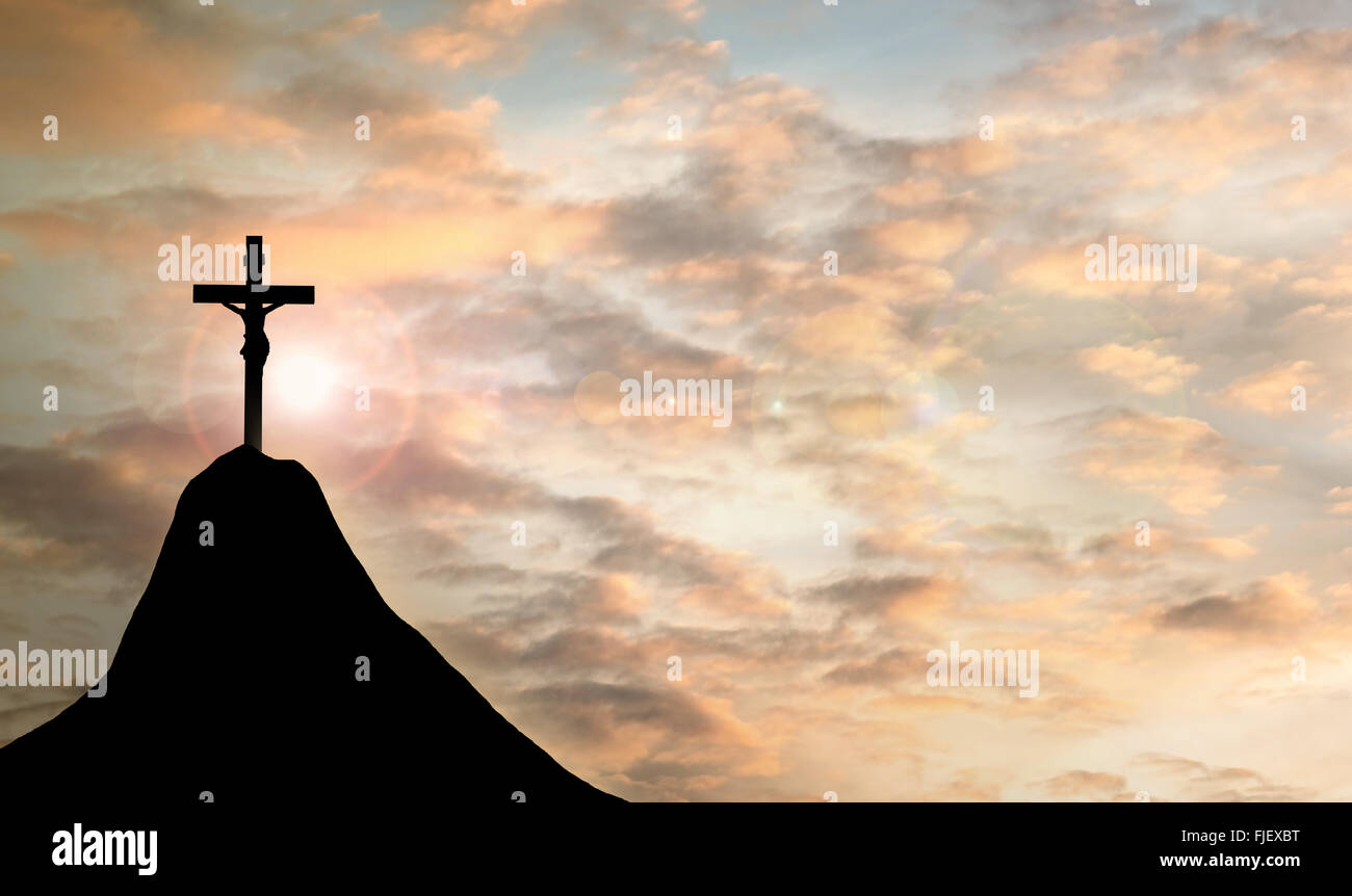 Silhouette Jesus and the cross over sunset on mountain top Stock Photo ...