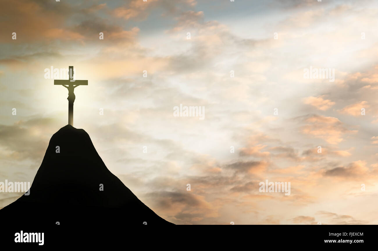 Silhouette Jesus and the cross over sunset on mountain top Stock Photo ...