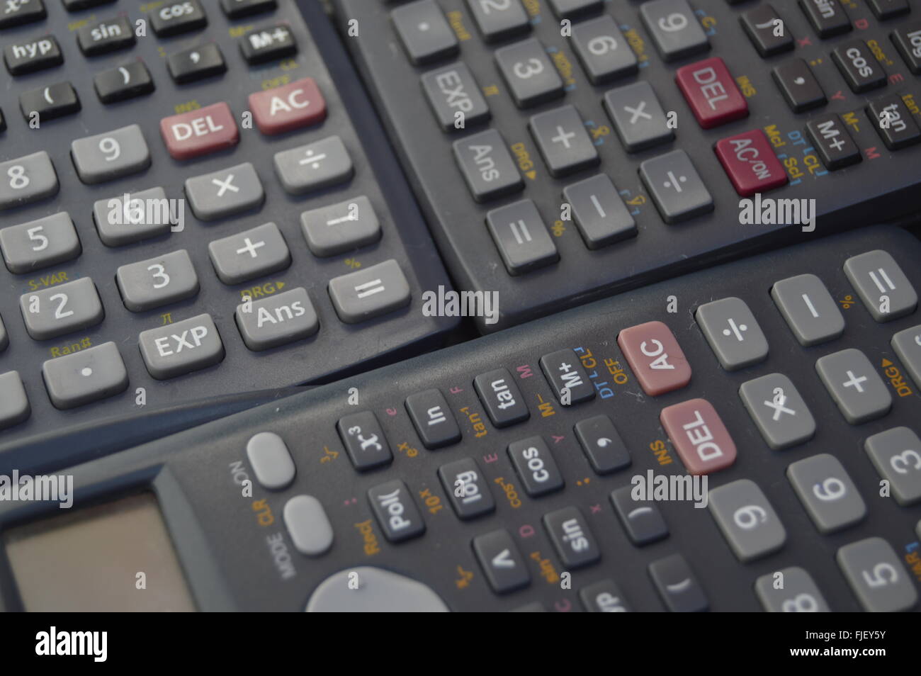 Electronic scientific calculators background Stock Photo - Alamy