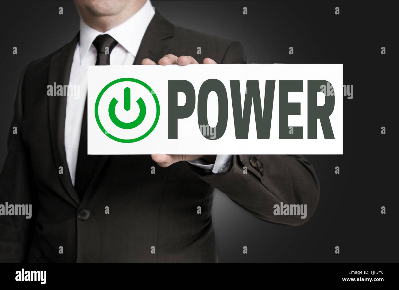 power sign is held by businessman Stock Photo - Alamy