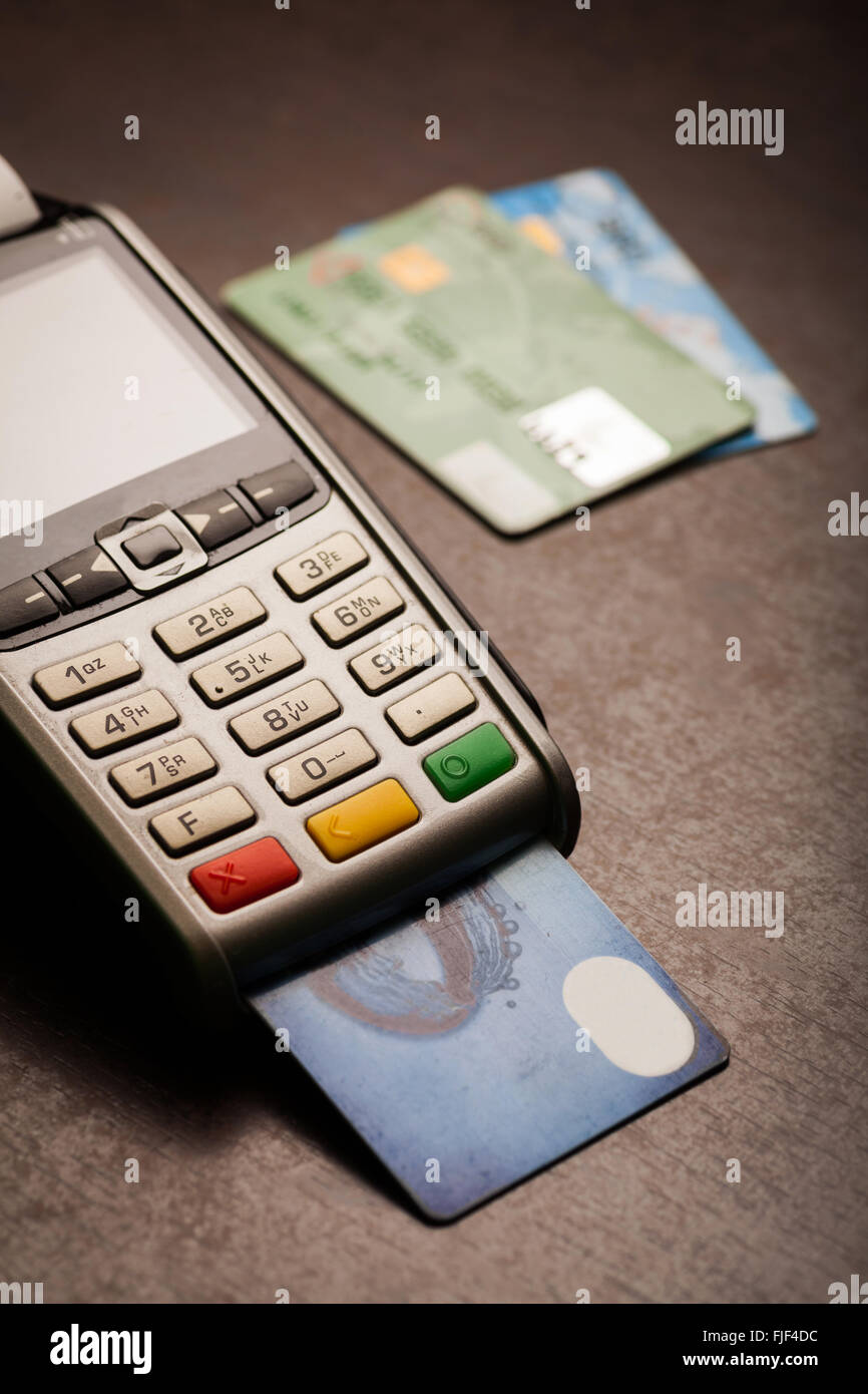 Color image of a POS and credit cards Stock Photo - Alamy