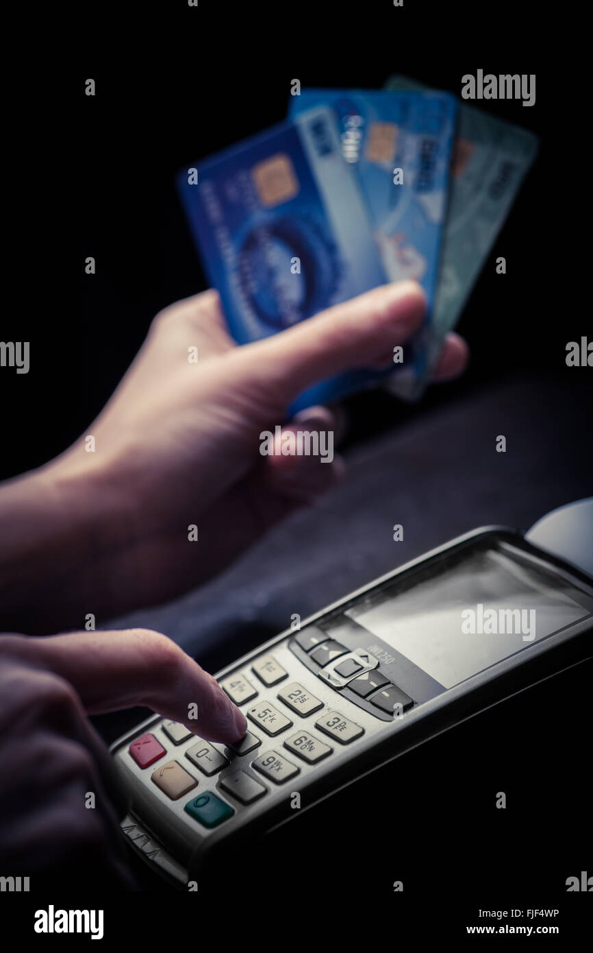 Color image of a POS and credit cards Stock Photo - Alamy