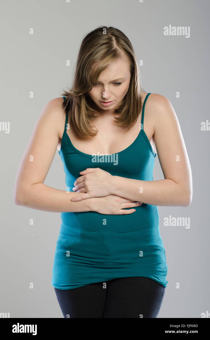 Woman belly hands not pregnant not man hi-res stock photography and images - Alamy