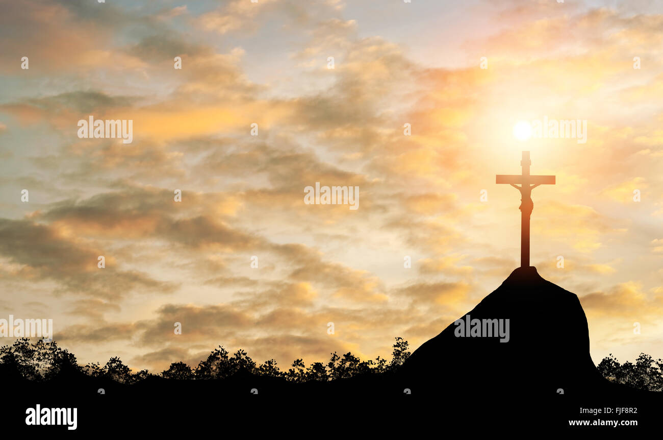 Silhouette Jesus and the cross over sunset on mountain top Stock Photo ...