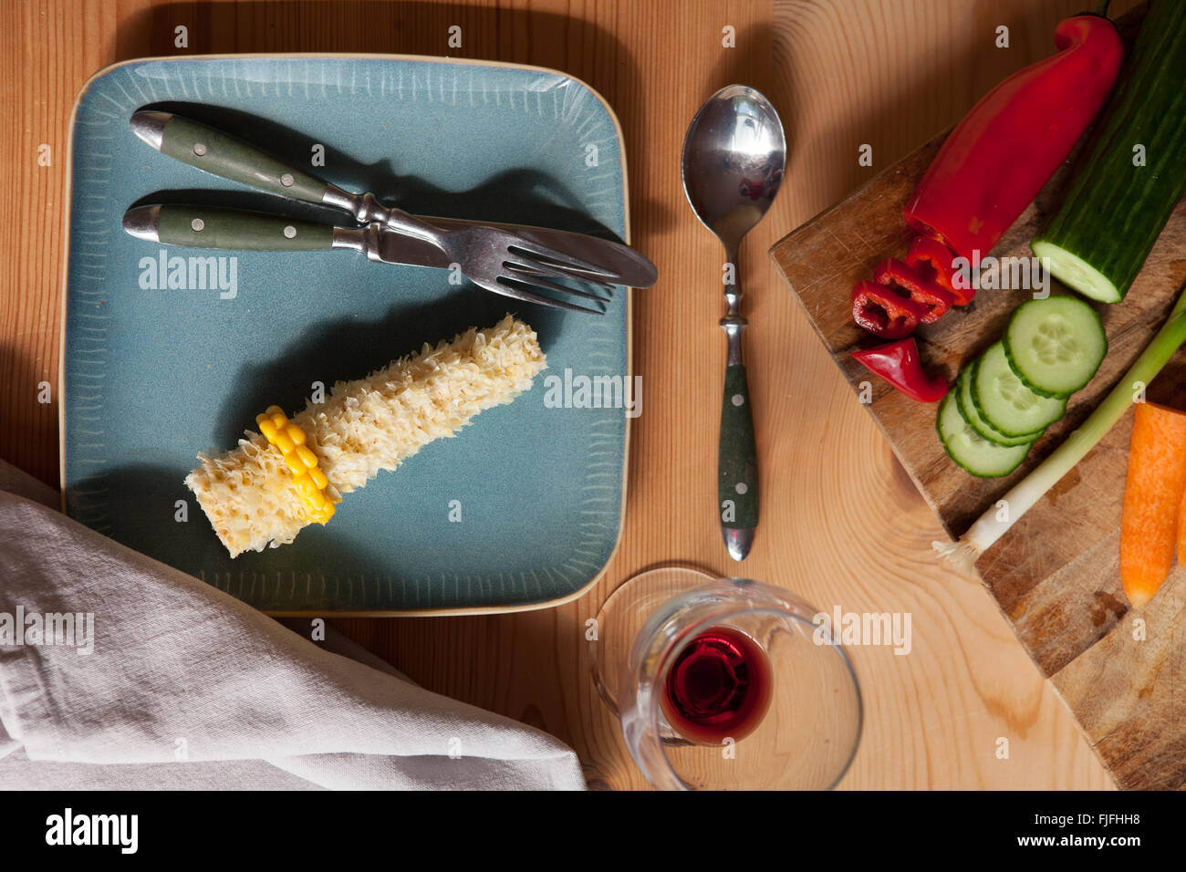 eaten sweetcorn with one ring of corn left Stock Photo - Alamy