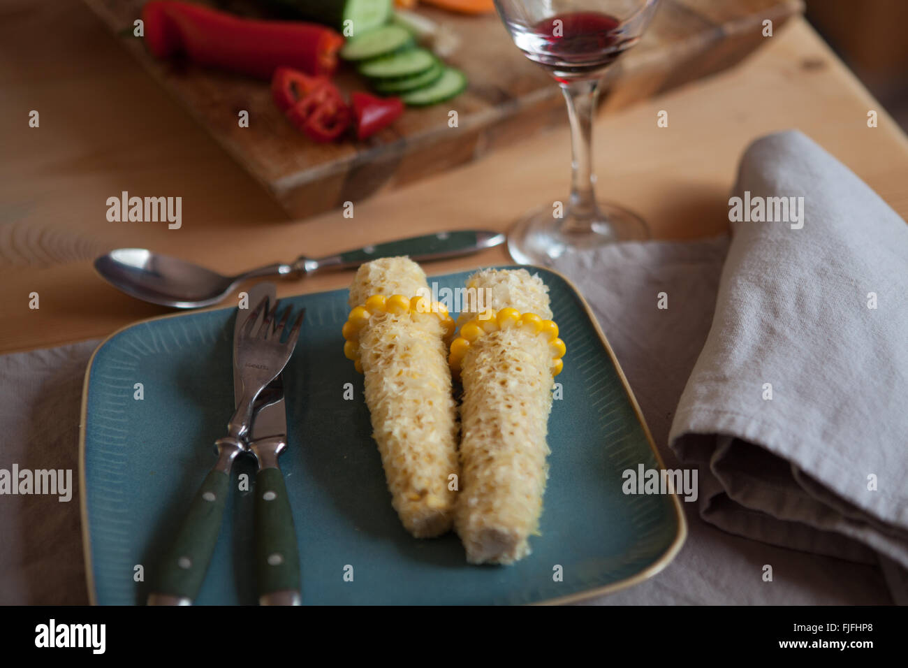 eaten sweetcorn with one ring of corn left Stock Photo - Alamy