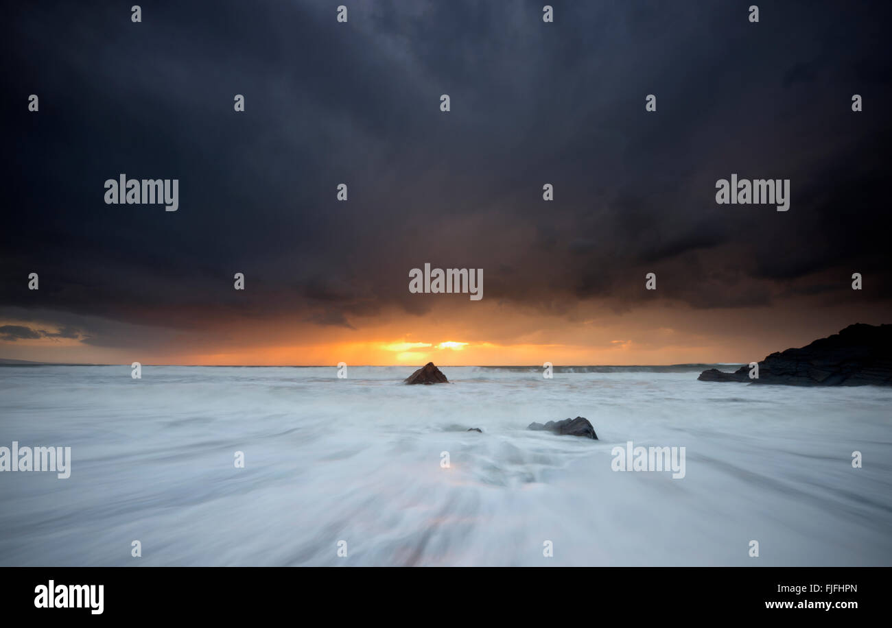 Dramatic sunset at Sandymouth Beach, Cornwall, UK Stock Photo - Alamy