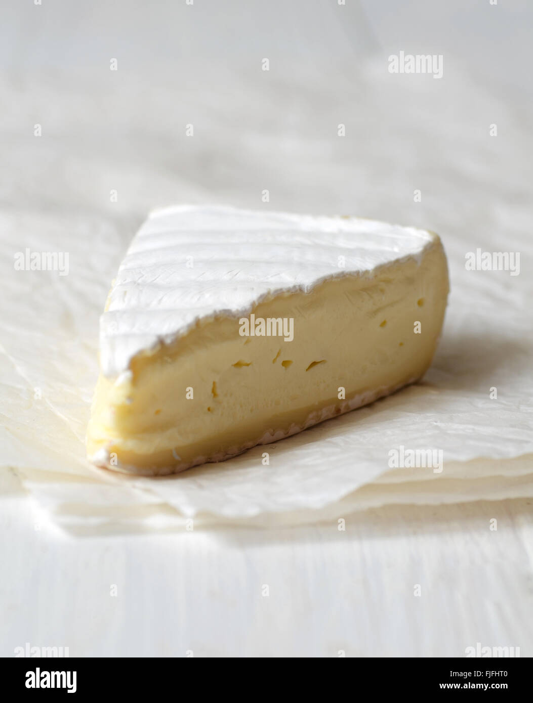 A Slice of Fresh Brie cheese, close up shot Stock Photo - Alamy