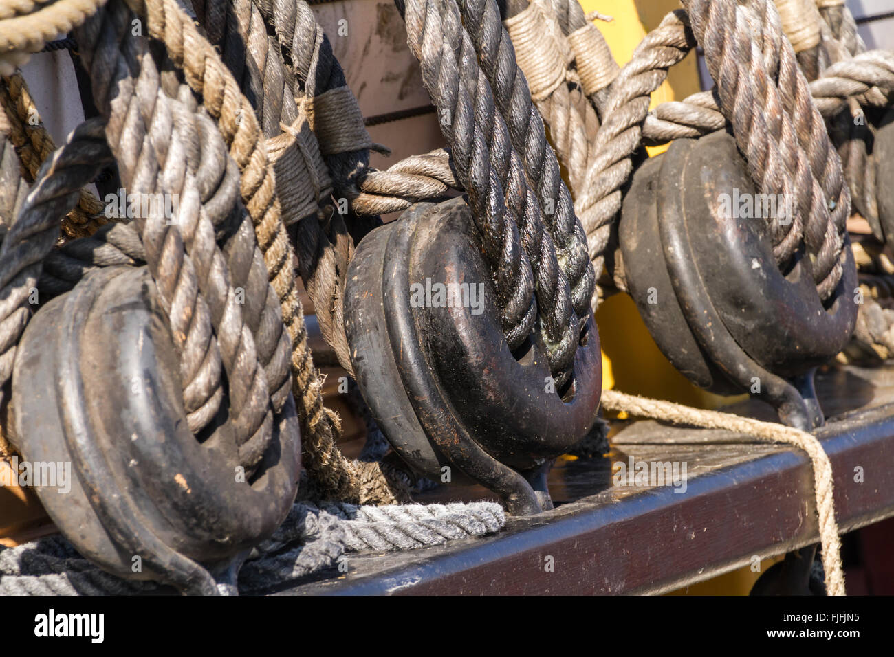 Blocks and tackle of the rigging of a tall ship Stock Photo - Alamy