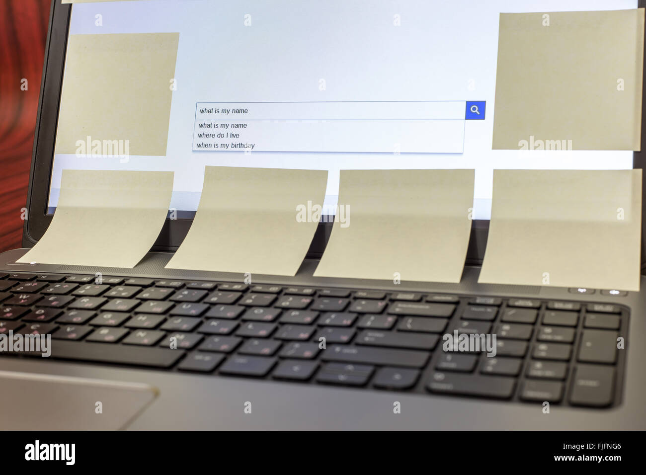 Laptop display covered with yellow sticky notes Stock Photo - Alamy