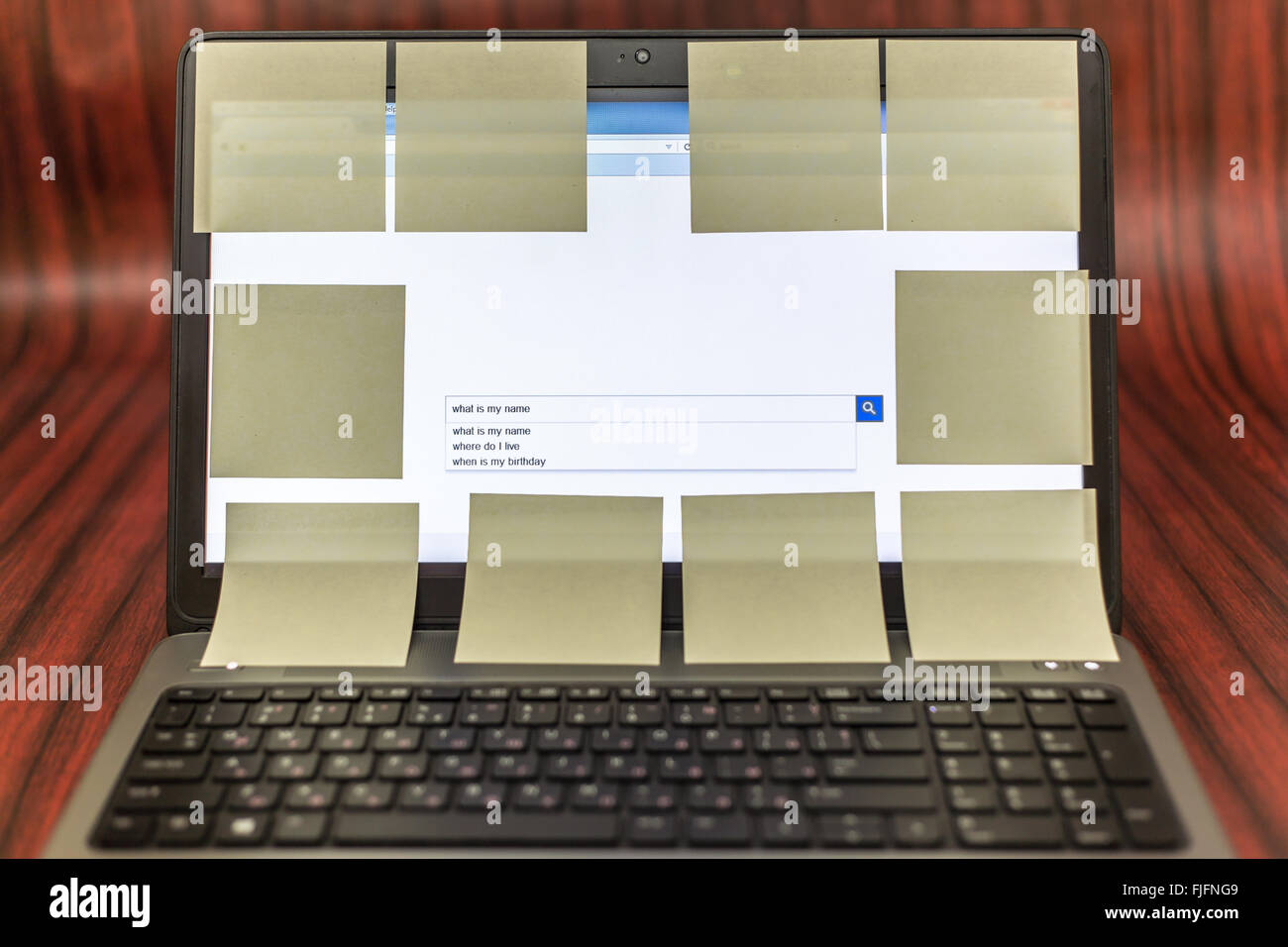 Laptop display covered with yellow sticky notes Stock Photo - Alamy