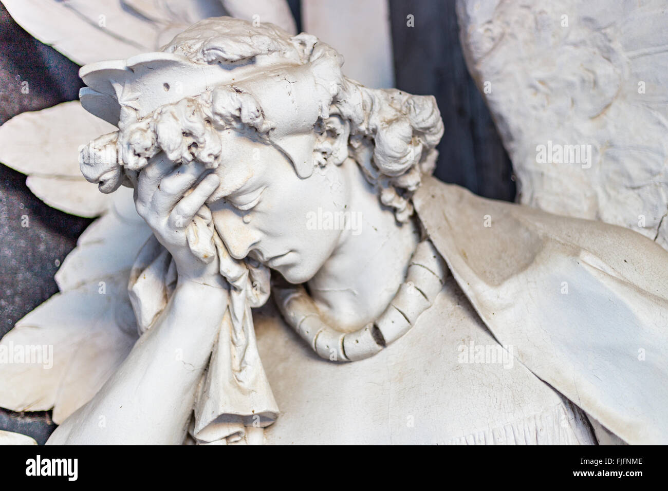 Crying Cherub Statue