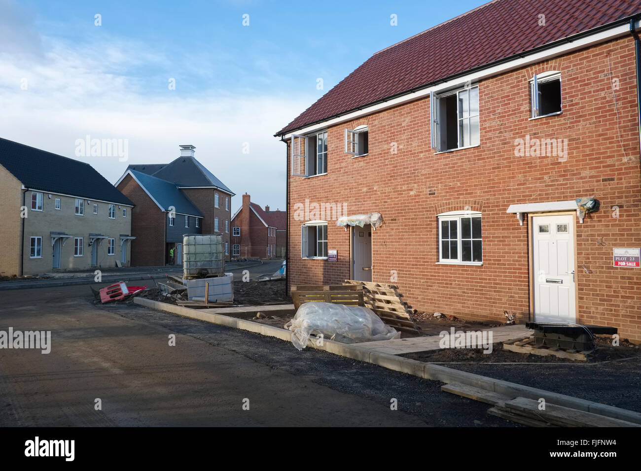 Nearly completed Houses on Construction Site Stock Photo - Alamy