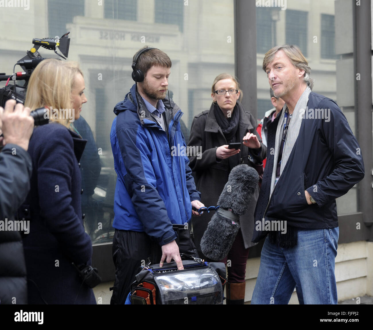 Richard Madeley stops to be interviewed following the shock passing of ...