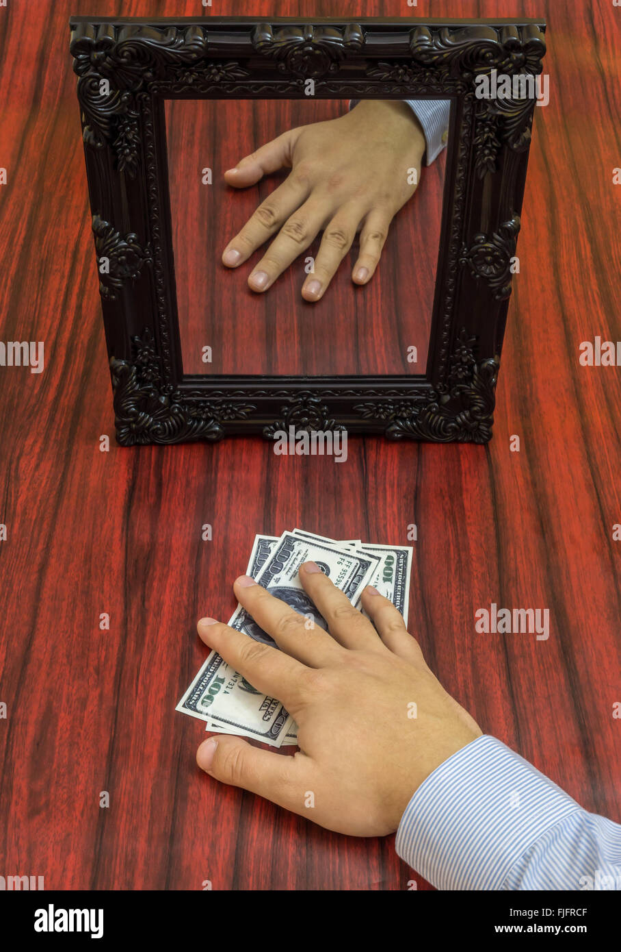 Human hand holding money without reflection in the mirror Stock Photo ...
