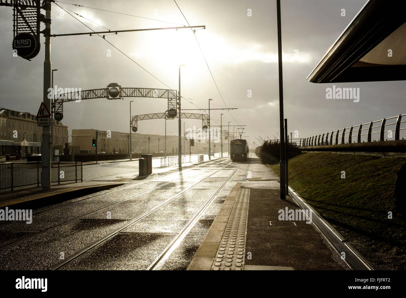 Tram approaching stop in a stormy Blackpool, Lancashire Stock Photo - Alamy