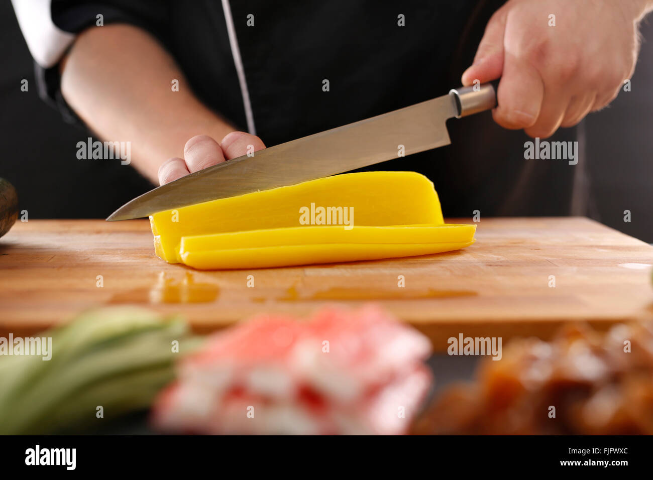 Sushi master preparing sushi in Japanese restaurant. Cuisines of the ...