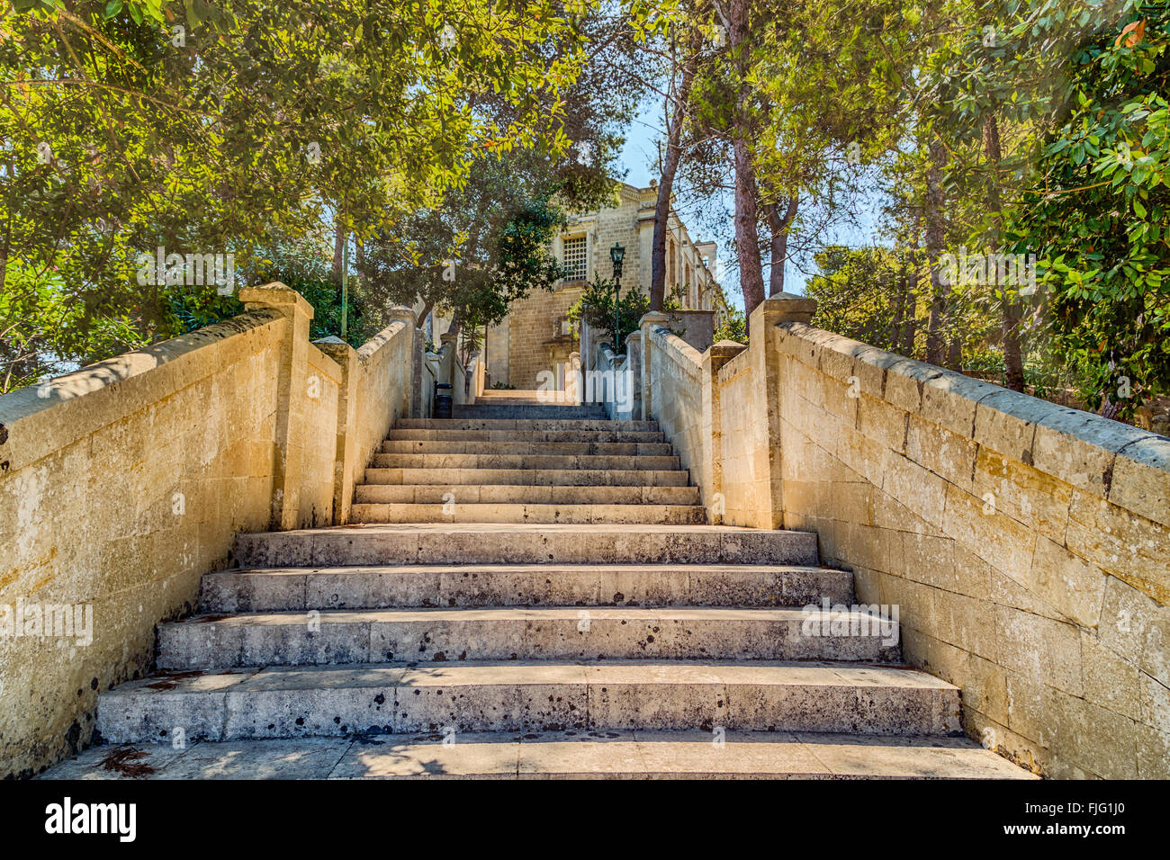 high steps of an ancient staircase that leads to a church Stock Photo ...
