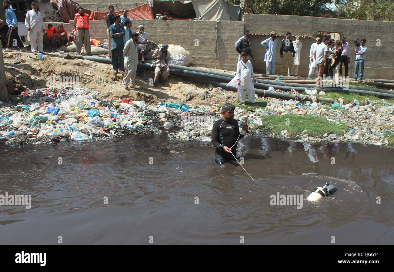 Rescuers of Pakistan Navy and Edhi Foundation are searching for two ...