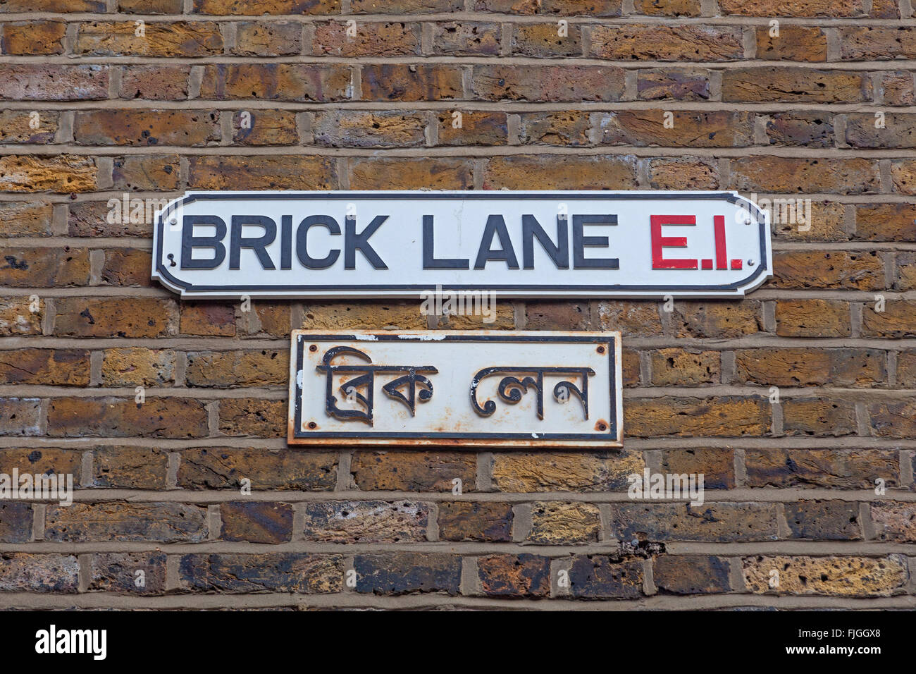 London, Spitalfields Dual-language signage in Brick Lane Stock Photo ...
