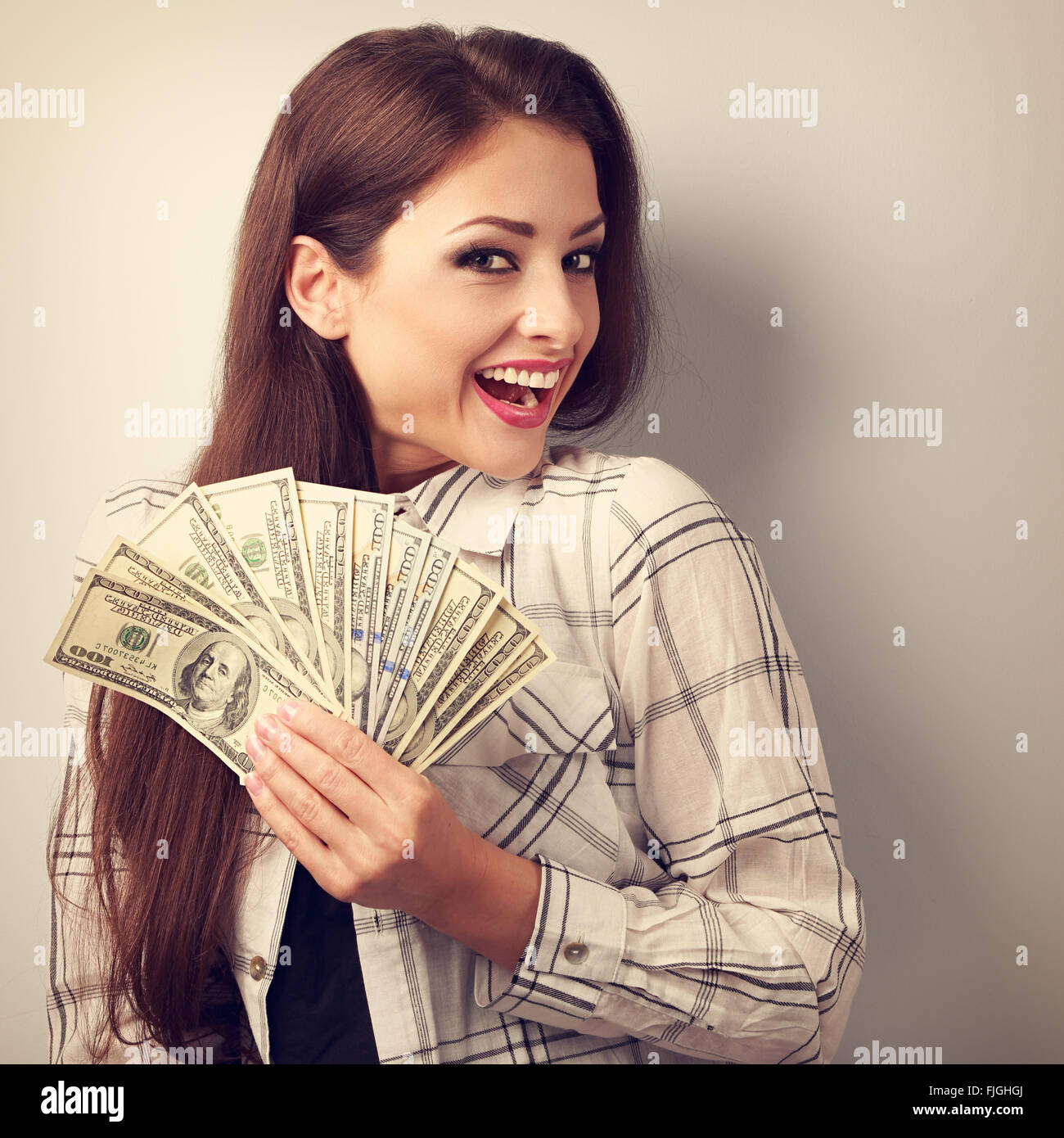 Young Woman Holding Cash Model Stock Photos & Young Woman Holding Cash ...