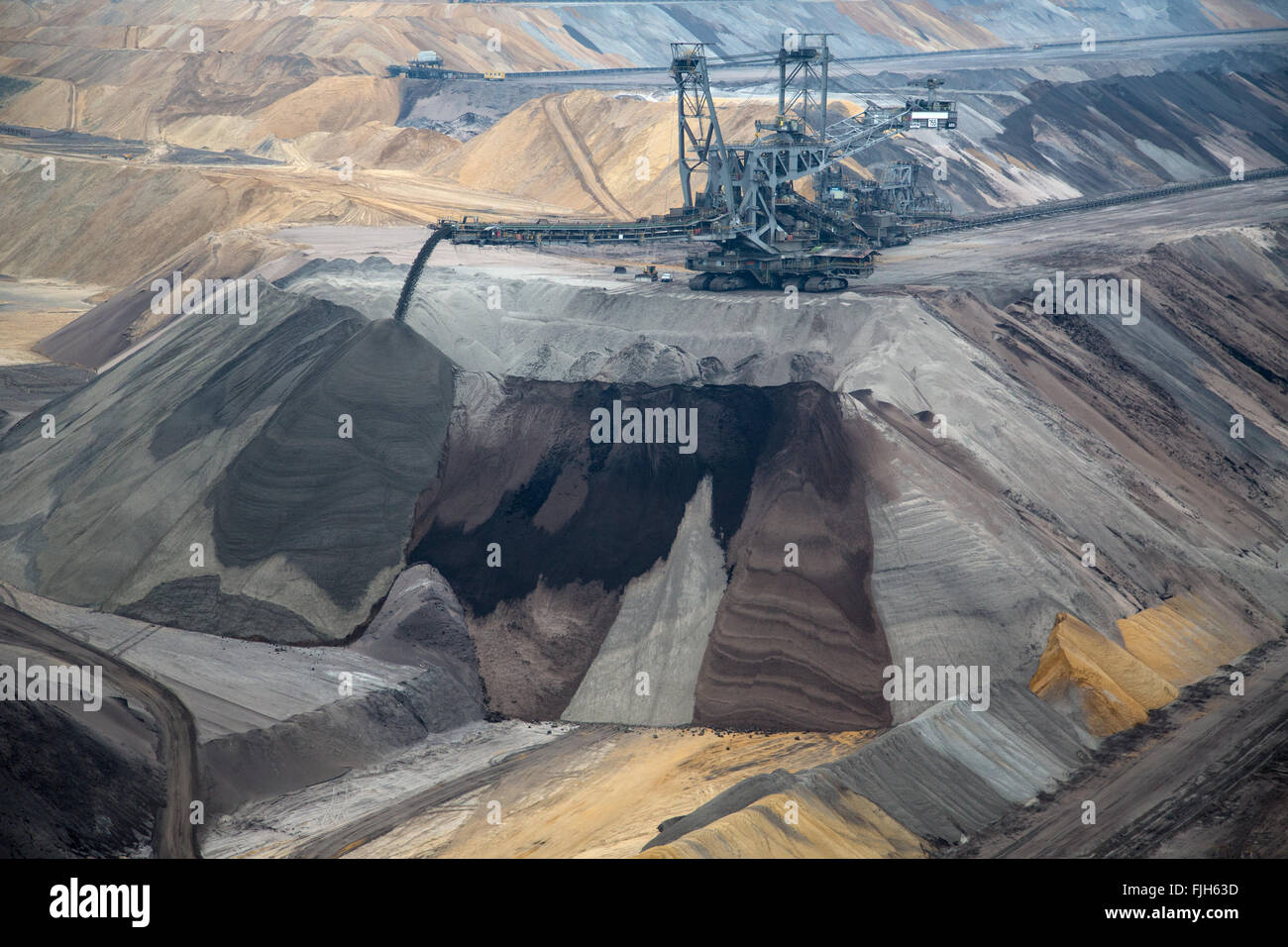 Garzweiler surface mine of lignite, brown coal, with excavator working ...