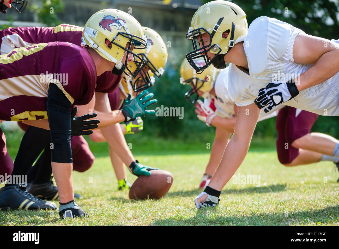 American football game - attack in progress Stock Photo - Alamy