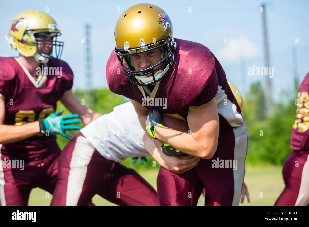 Football players run after ball hi-res stock photography and images - Alamy