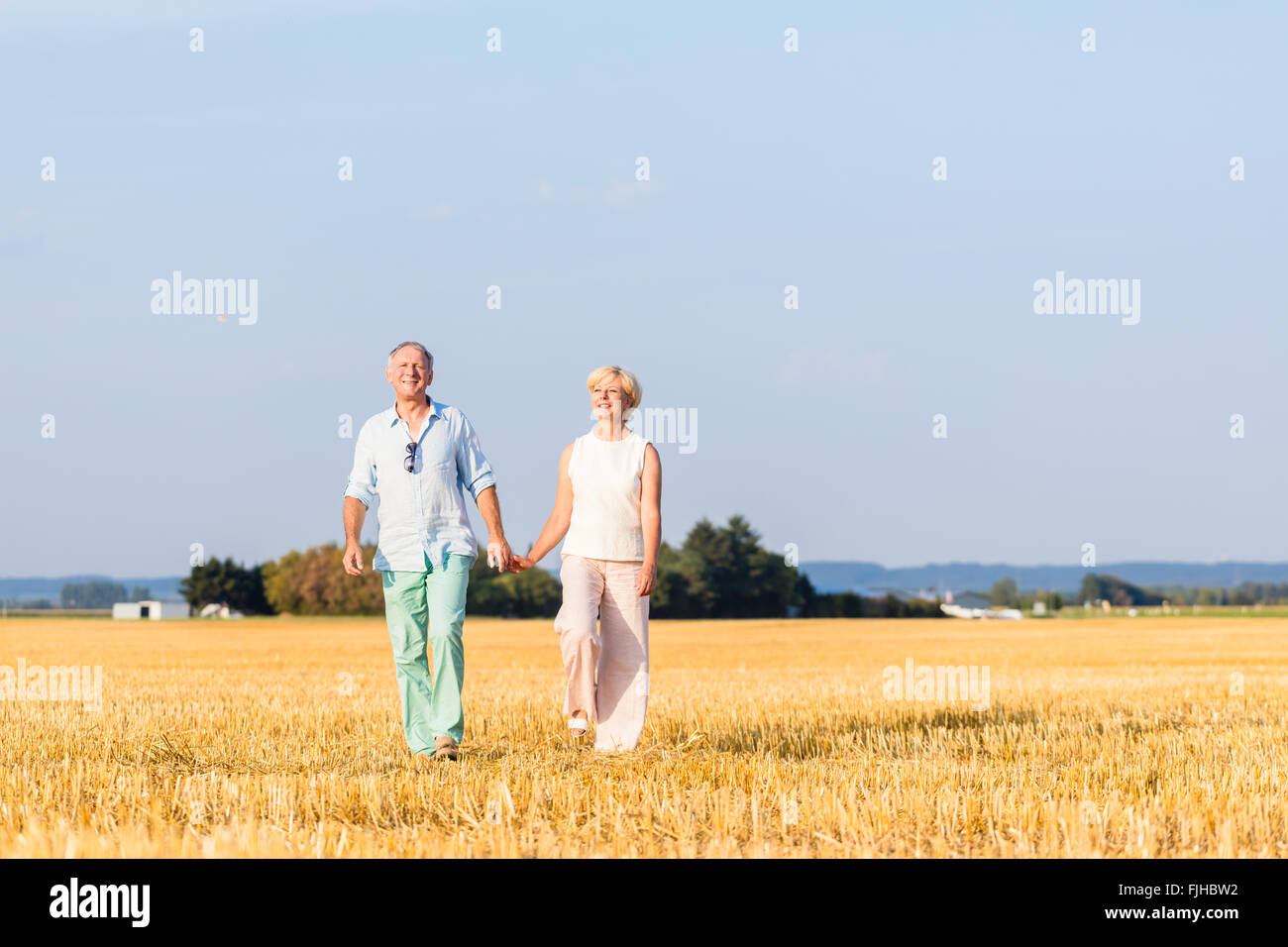Loving senior man husband holding hi-res stock photography and images ...