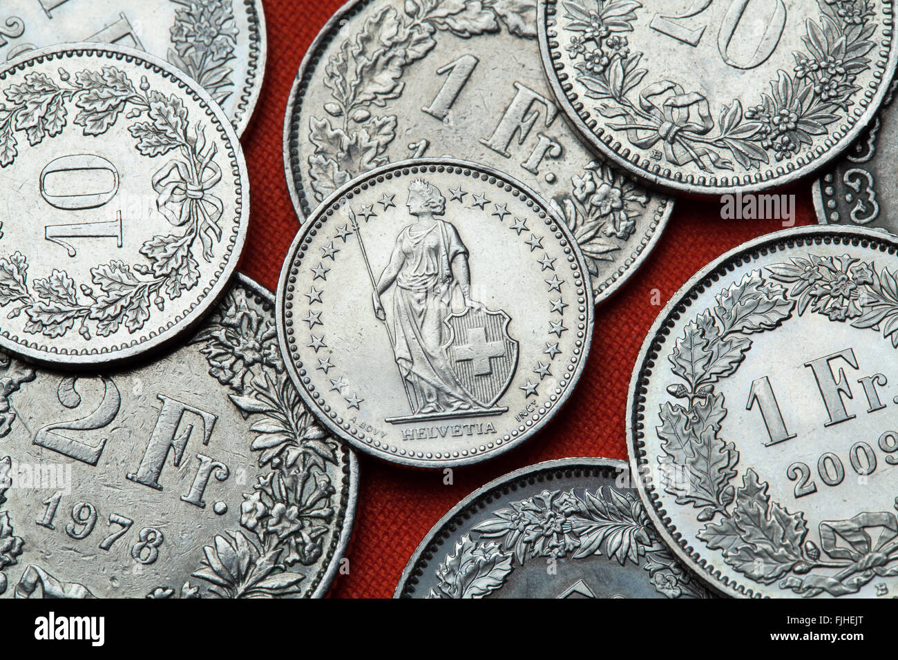 Swiss franc coins switzerland centimes hi-res stock photography and ...