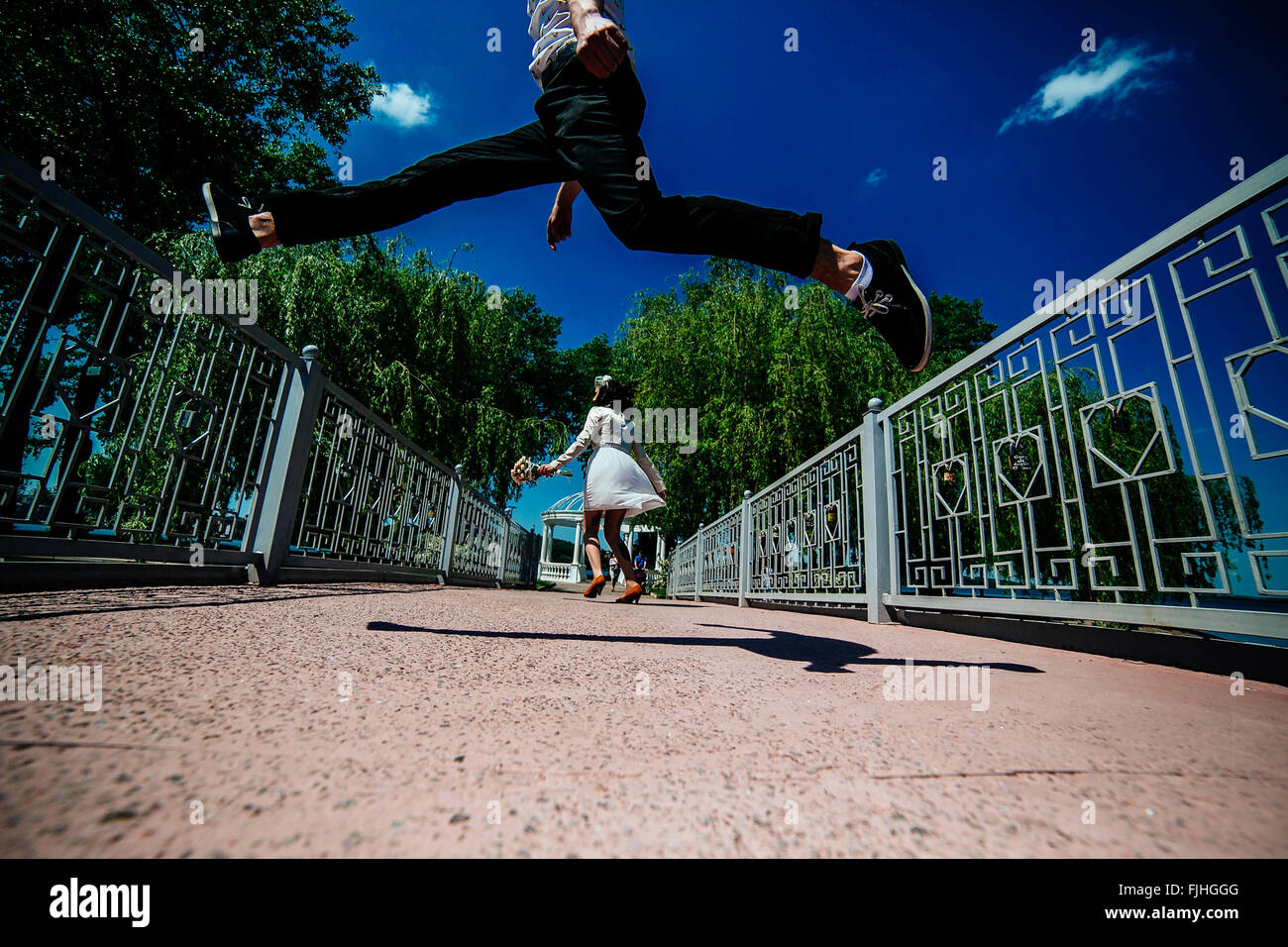 beautiful couple on the bridge Stock Photo - Alamy