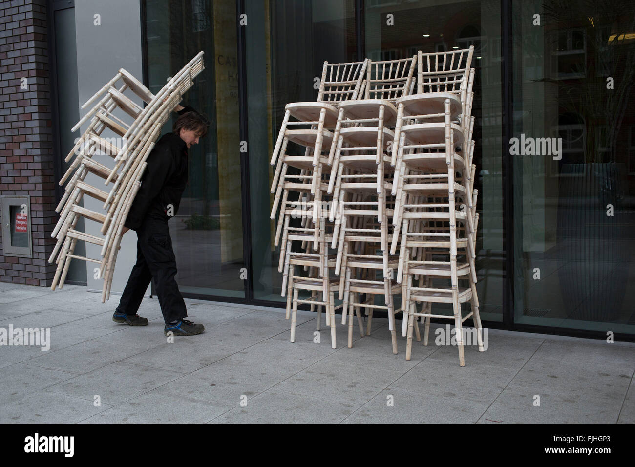 Stacking chairs hi-res stock photography and images - Alamy