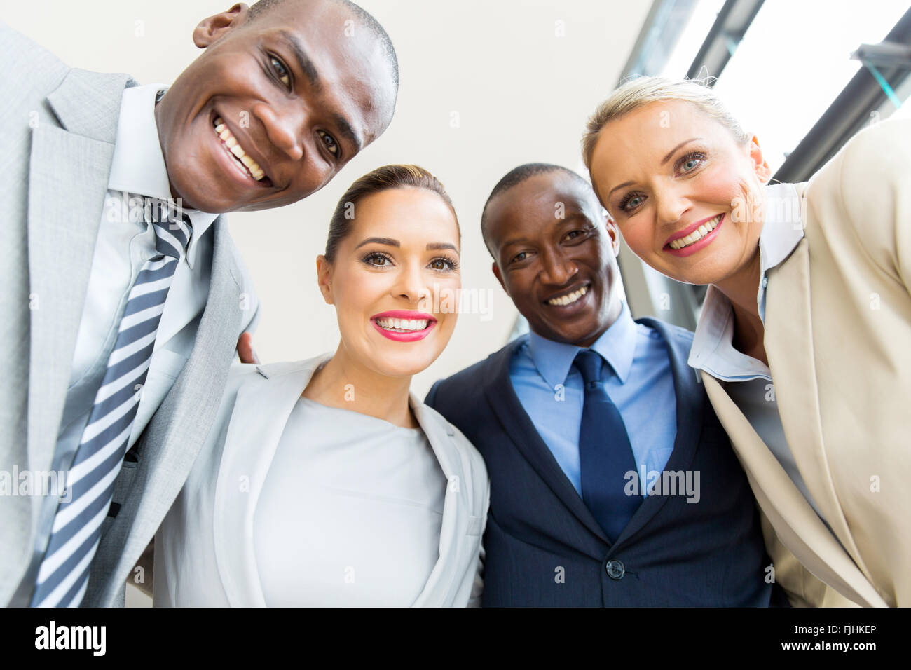 successful business group looking down Stock Photo - Alamy