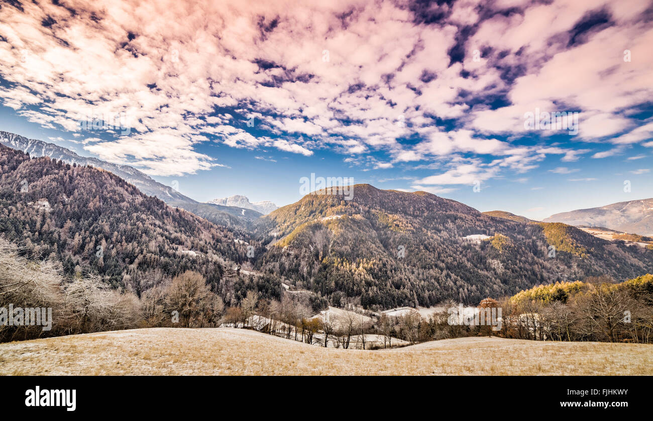 reddish sky on snow-capped mountains Stock Photo - Alamy