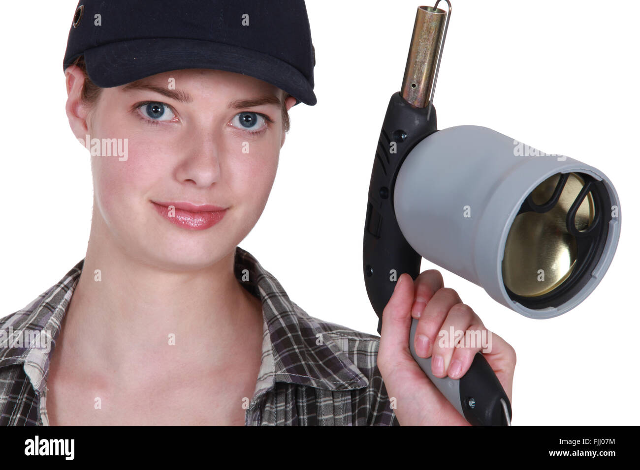 Woman with a blowtorch Stock Photo - Alamy