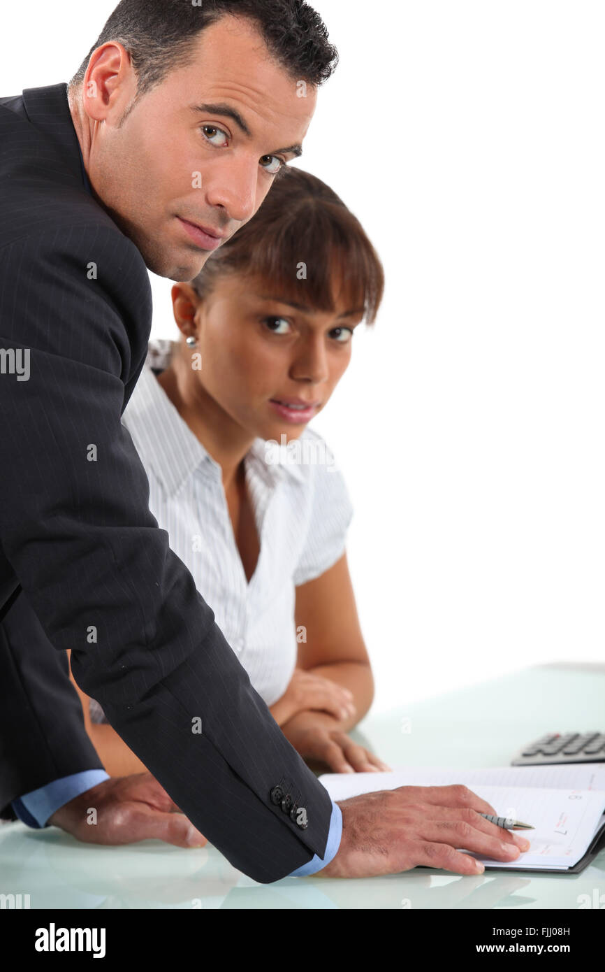 Help with colleagues Stock Photo - Alamy