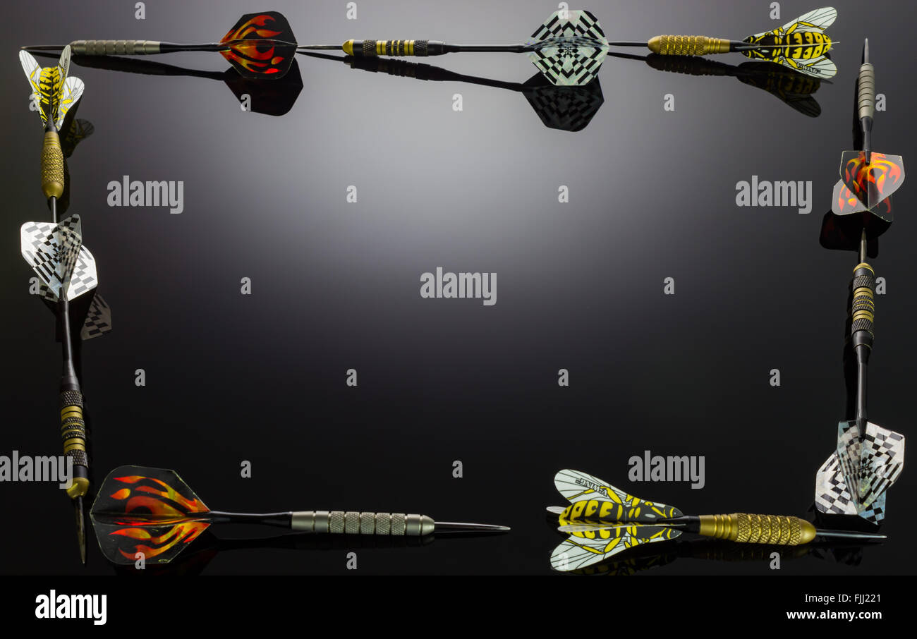 Border or colorful darts of the game Stock Photo - Alamy