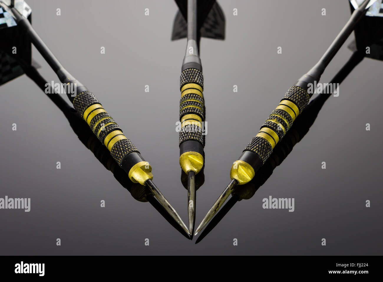 Black and white darts of the game Stock Photo - Alamy