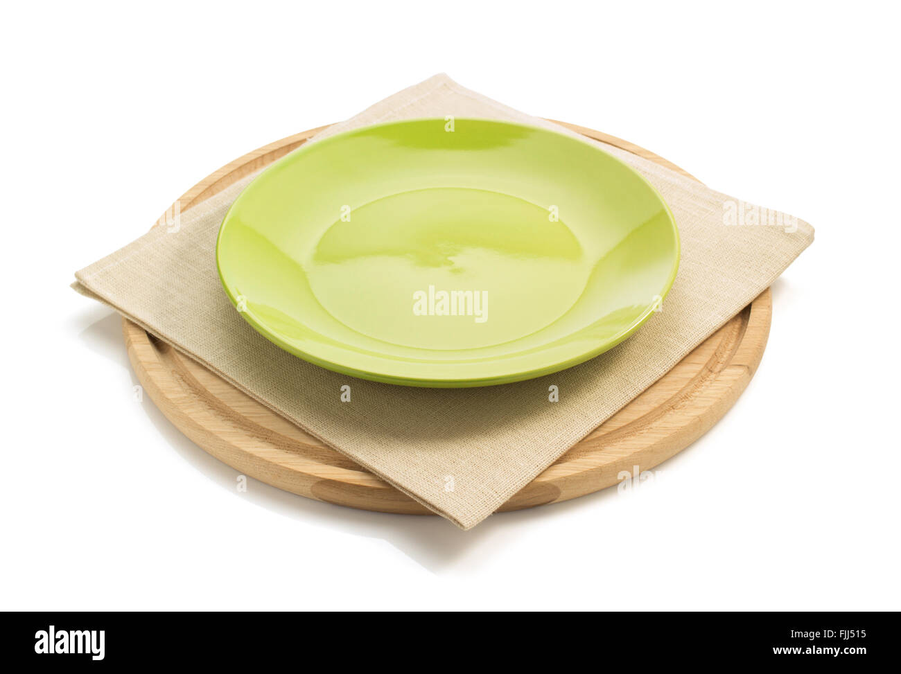 plate at napkin cloth on white background Stock Photo - Alamy